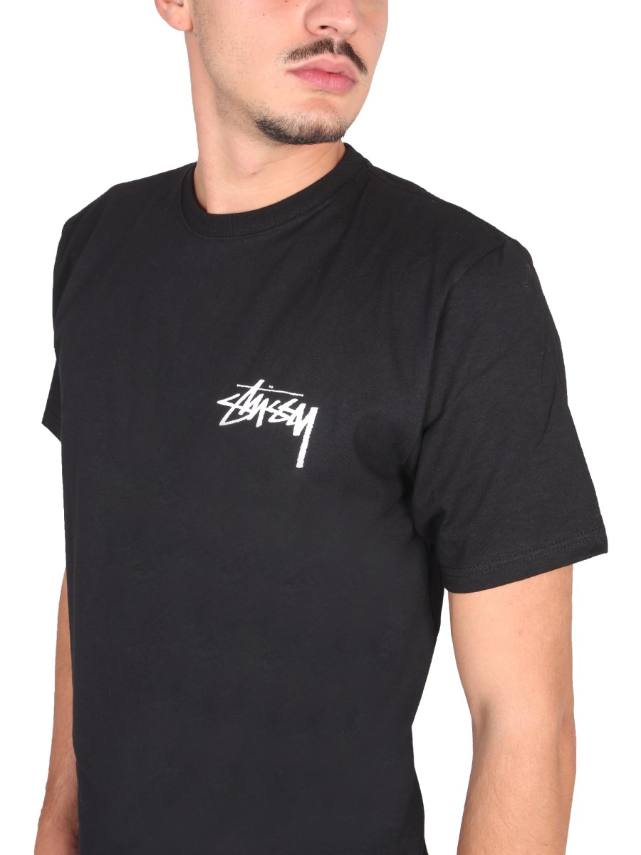 STUSSY - CREWNECK COTTON JERSEY T-SHIRT WITH LOGO PRINT - Eleonora Bonucci